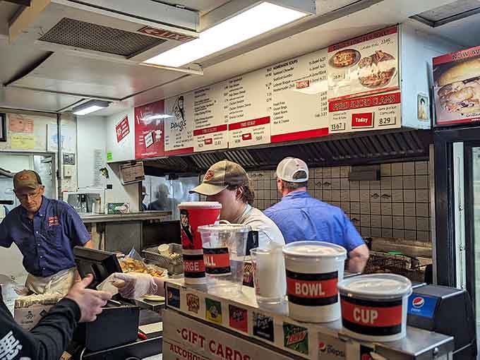 Behind that counter, the magic happens: fresh fish meets hot oil in a beautiful, crispy relationship we all envy.