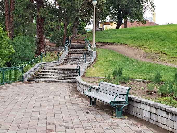 Brick pathways and benches invite you to sit, stay awhile, and remember what relaxation actually feels like.