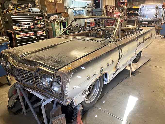 This Impala convertible is mid-restoration, proving that even miniature dreams require patience, skill, and elbow grease.