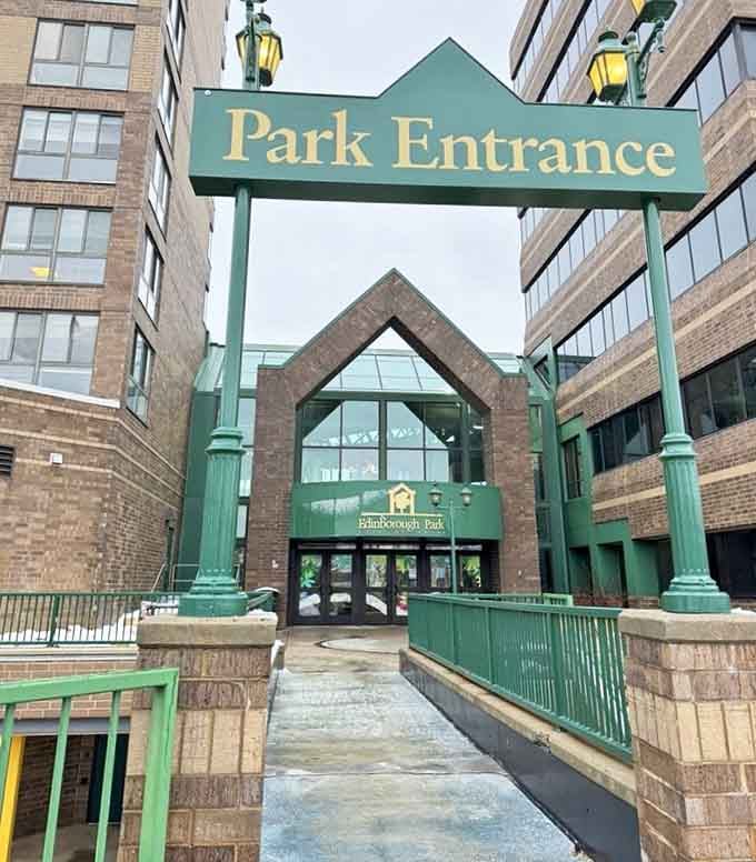 The entrance arch stands proud, welcoming families to escape reality and embrace climate-controlled fun for hours on end.