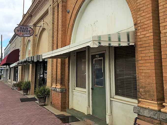 Local establishments line the streets, offering services that actually know your name, not your account number.