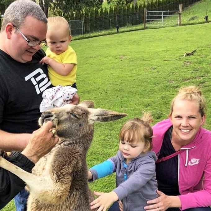 Family photos reach a whole new level when you can include an actual wallaby as your plus-one guest.