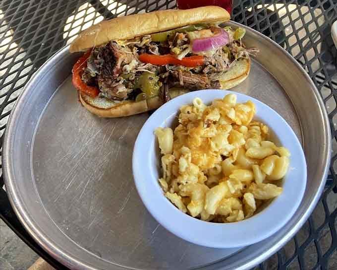 A Philly sandwich with a side of creamy mac and cheese proves this kitchen knows comfort food inside out.