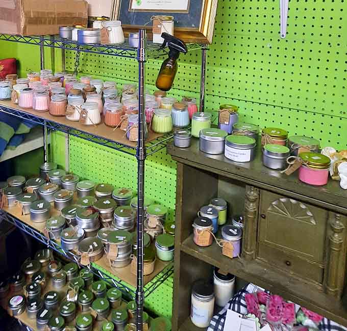 Handmade candles in rainbow hues transform ordinary shelves into a fragrant, colorful sensory experience worth exploring.
