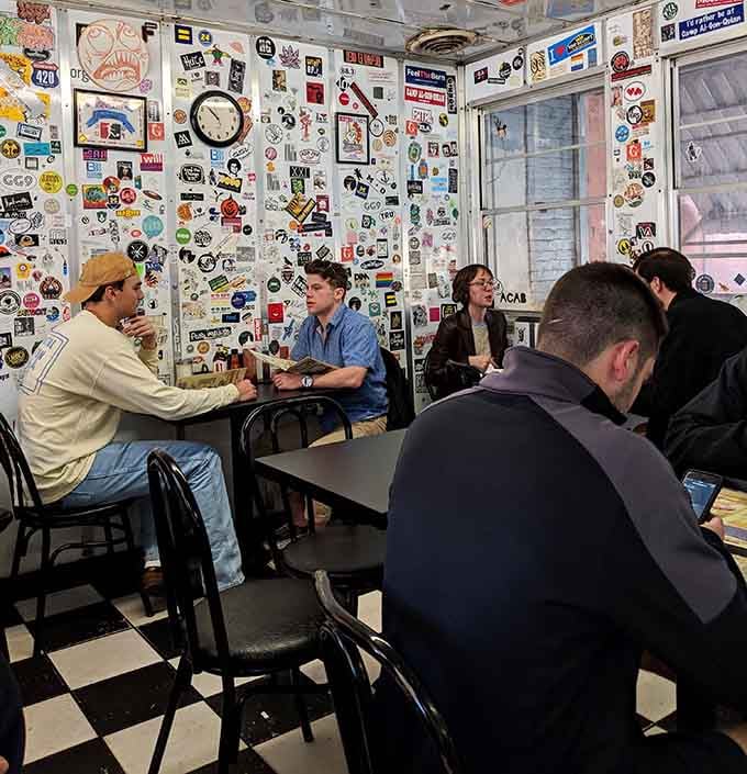 Where strangers become friends over hash browns, and the sticker-covered walls witness countless late-night conversations unfold.