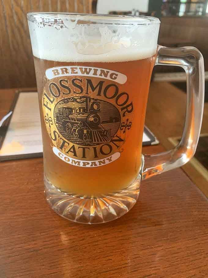 Their house-brewed beer in a proper mug, golden and inviting like liquid sunshine in a glass.