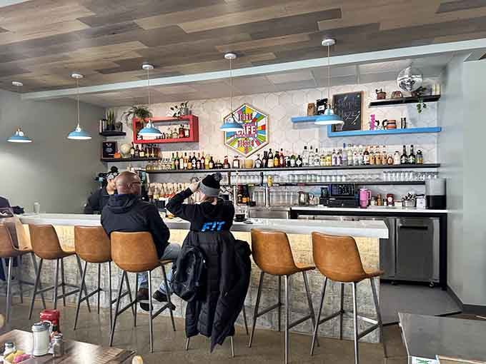 The bar area offers counter seating where solo diners can enjoy breakfast without feeling like they're eating alone awkwardly.