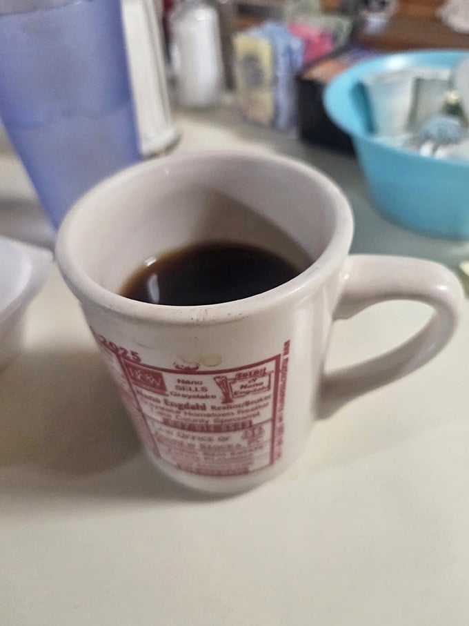 Diner coffee served in a classic mug, the kind that gets refilled before you even realize you need more.