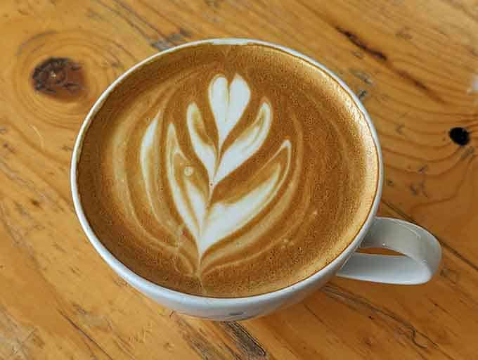 That perfectly poured cappuccino with latte art shows the same care goes into drinks as it does baked goods.