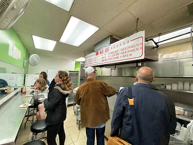 The universal language of pointing at menus transcends all barriers when dumplings are involved and everyone's hungry.