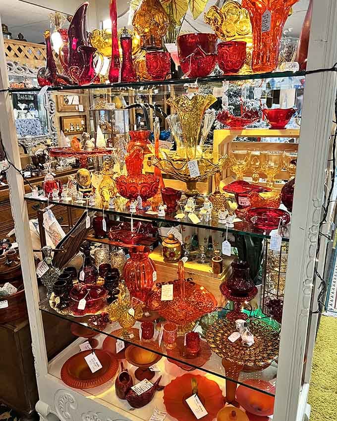 Colored glass catches light like jewels, turning ordinary shelves into a kaleidoscope of vintage American craftsmanship.