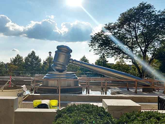 Even under construction, this sculpture commanded respect, like a judge taking a brief recess before the next session.