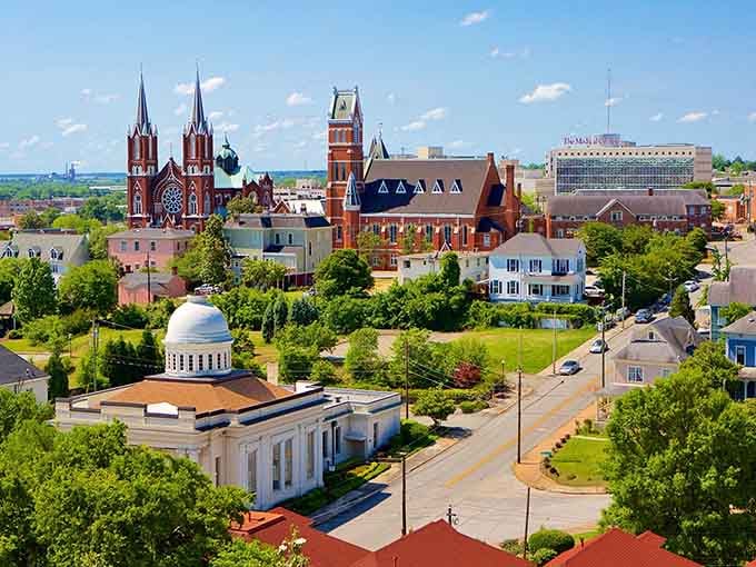 Macon's historic architecture tells stories that textbooks can't capture, with church spires reaching toward endless blue skies.