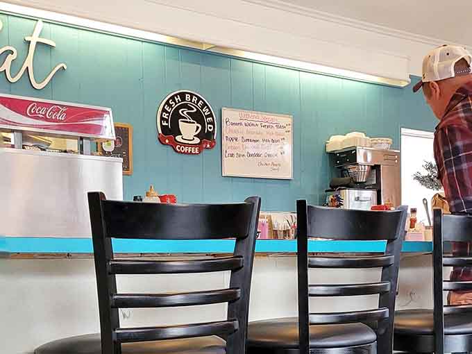 The counter seating offers front-row views to the breakfast theater, where skilled hands create morning magic all day long.