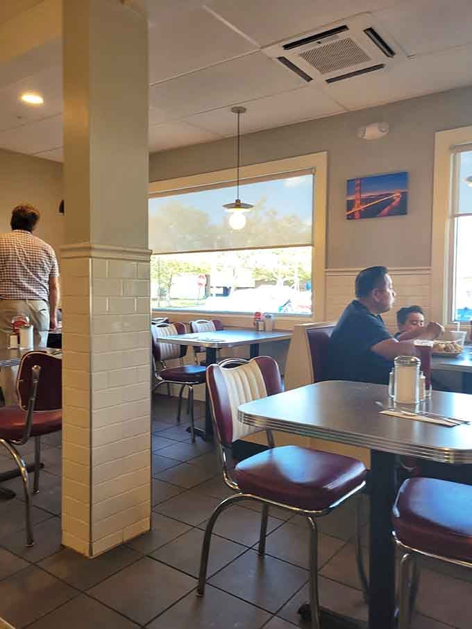 Counter seating where strangers become friends over coffee refills and shared appreciation for good breakfast food.