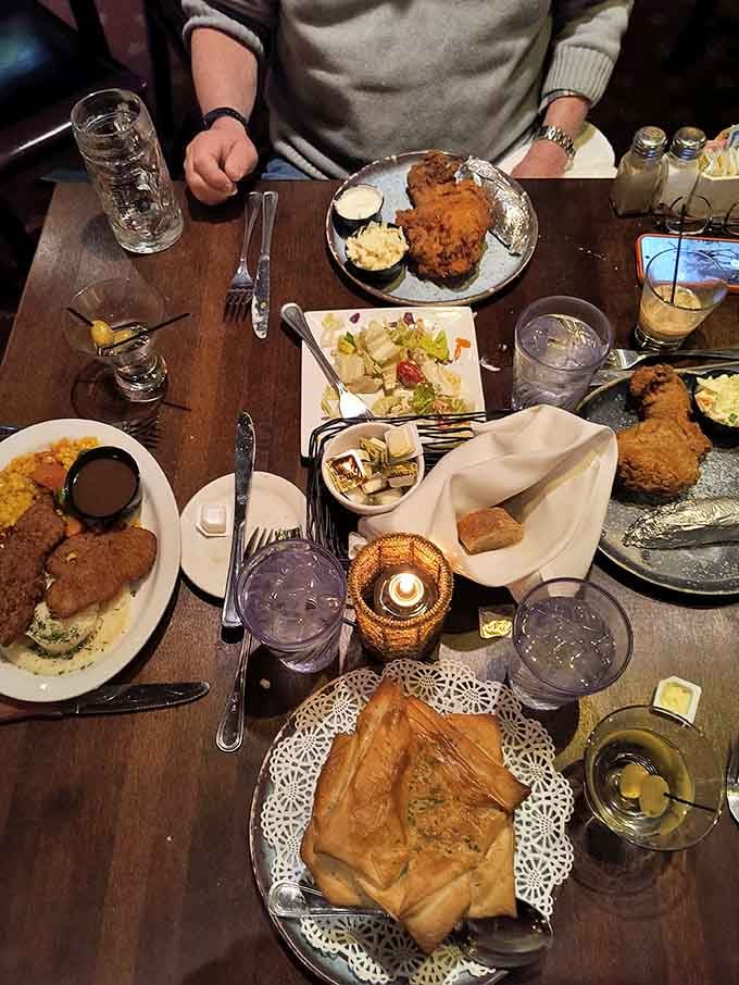 The spread of a proper feast, where fried chicken and pot pie share space like old friends reuniting.