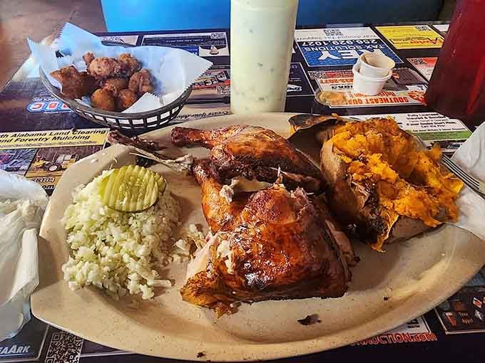 Barbecue chicken and sweet potato that look like they just won the lottery of perfectly cooked comfort food.