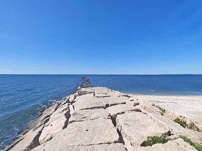 The jetty extends into Long Island Sound like a stone highway to nowhere, perfect for contemplative strolls.