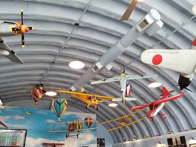 Aviation memorabilia and vintage signs create an atmosphere that's part museum, part restaurant, entirely delightful for history buffs.