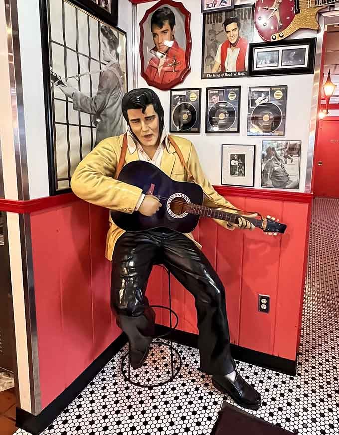 The King watches over diners, guitar in hand, ensuring everyone leaves feeling a little more rock and roll.