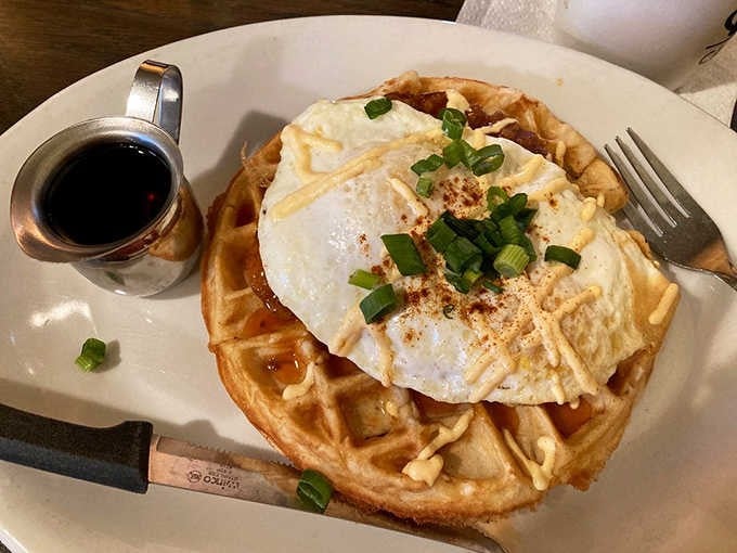 That Belgian waffle just became the foundation for orange-glazed fried chicken, eggs, and pure breakfast genius.