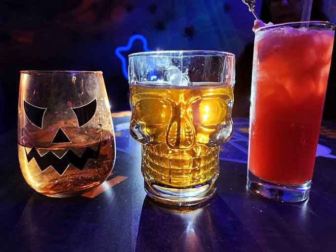 Skull glasses and jack-o'-lantern cups turn ordinary beverages into Instagram-worthy props that taste just as good as they photograph.