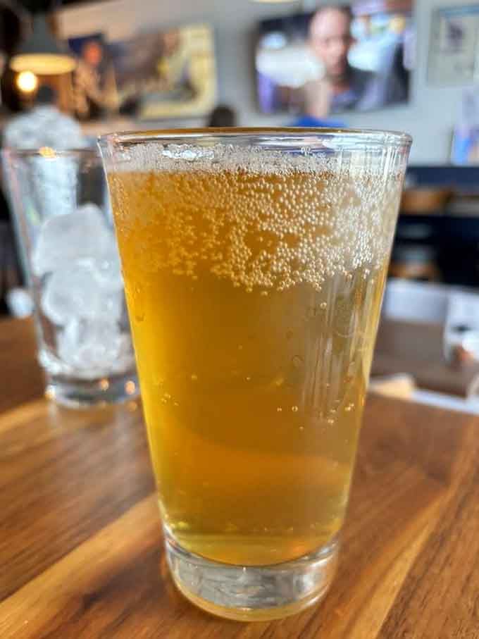 Crisp golden cider that pairs beautifully with deep dish or just sipping while you wait patiently.