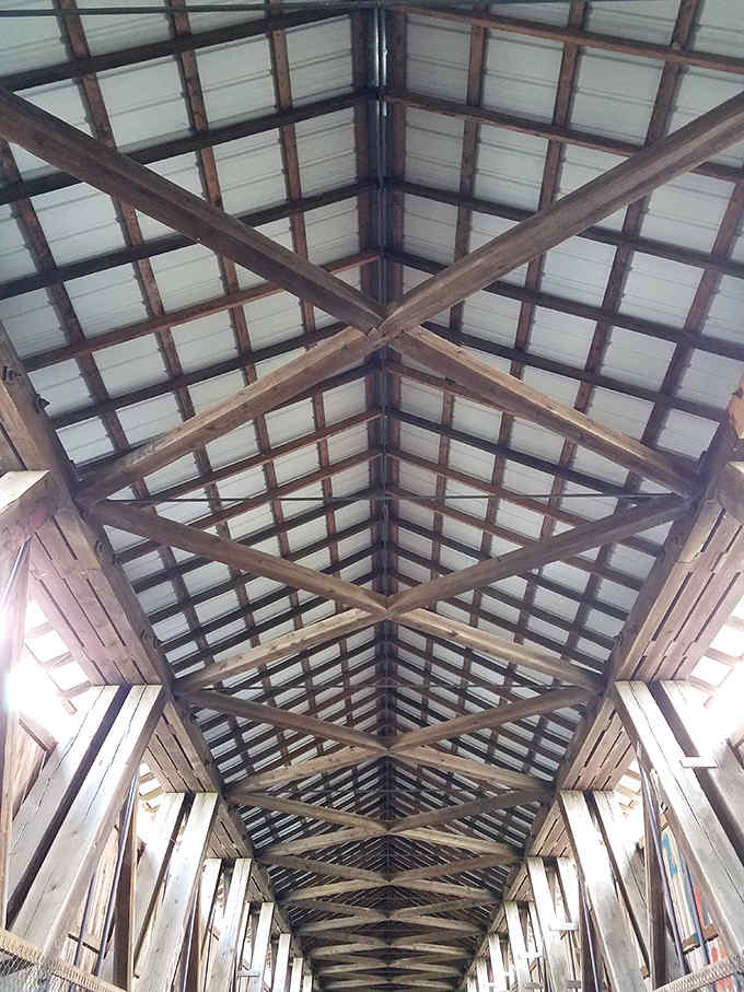 The ceiling's intricate truss work proves that functional can also be absolutely beautiful when done right.