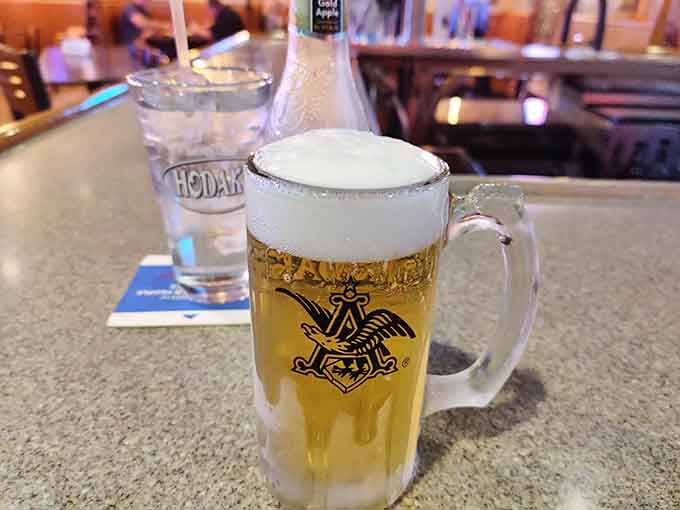 Cold beer in a frosted mug, the ideal companion for hot fried chicken on any given day.