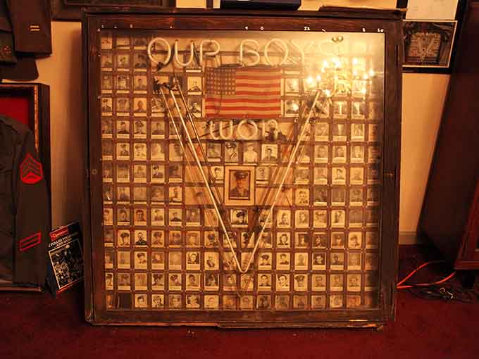 The "Our Boys" memorial honors local veterans, their faces frozen in time, their service never forgotten by neighbors.