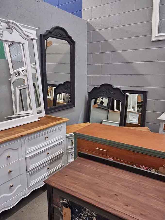 Mirrors and dressers proving that bedroom furniture used to be built like it was preparing for battle.