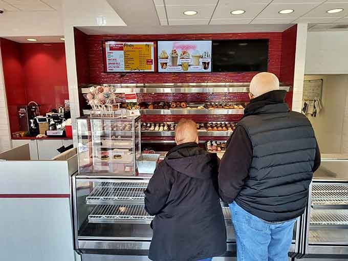 The moment of truth: choosing your donuts while trying not to order one of everything in sight.