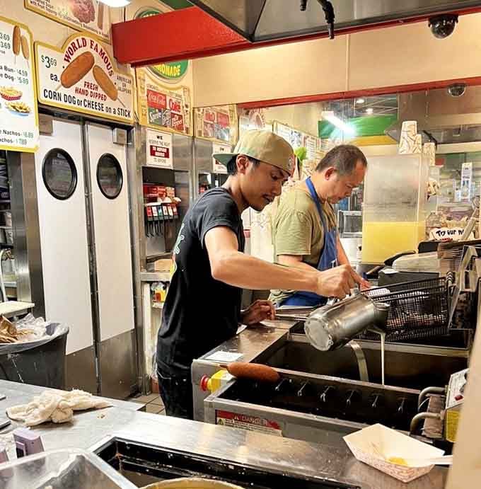 Behind the counter, the team works their magic, turning simple ingredients into fried happiness all day long.