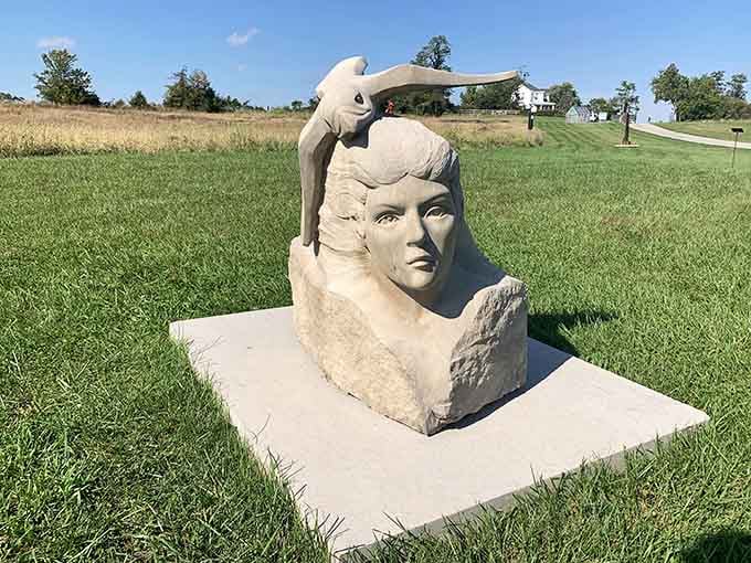 A serene stone face gazes across the landscape, channeling ancient wisdom with distinctly contemporary style and grace.