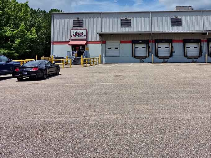 From the outside, it looks like any warehouse, but inside lies the answer to every racing fantasy you've ever had.