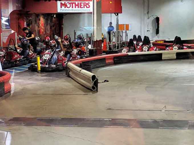 The pit area where champions are made and excuses are born, usually involving "that one turn" that everyone somehow missed.