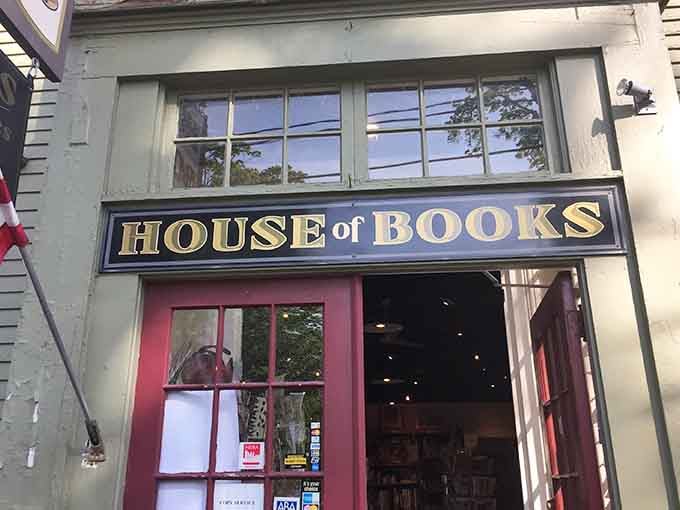 House of Books beckons with that bright pink door, because apparently even bookstores can have excellent fashion sense.