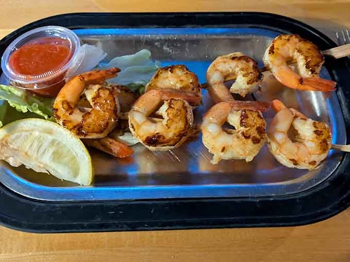 Grilled shrimp skewers that prove you don't need fancy plating when the food tastes this good straight off the grill.