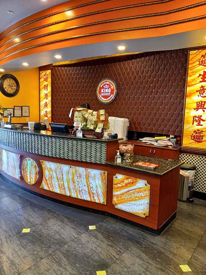 The welcoming front desk where your all-you-can-eat journey officially begins, no turning back now, friend.