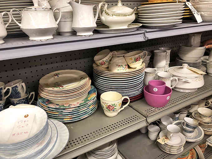 Stacks of plates and teacups tell silent stories of dinner parties past, waiting for their next chapter.