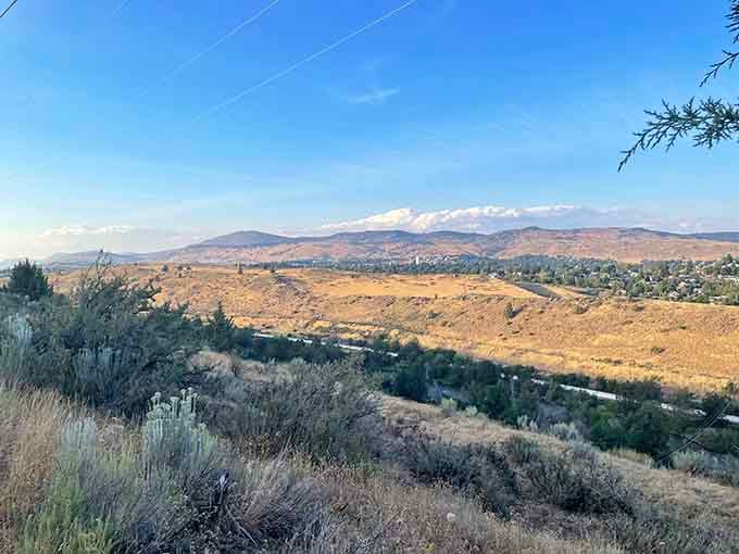 Moore Mountain's high desert landscape stretches toward distant peaks, offering views money can't buy anywhere.