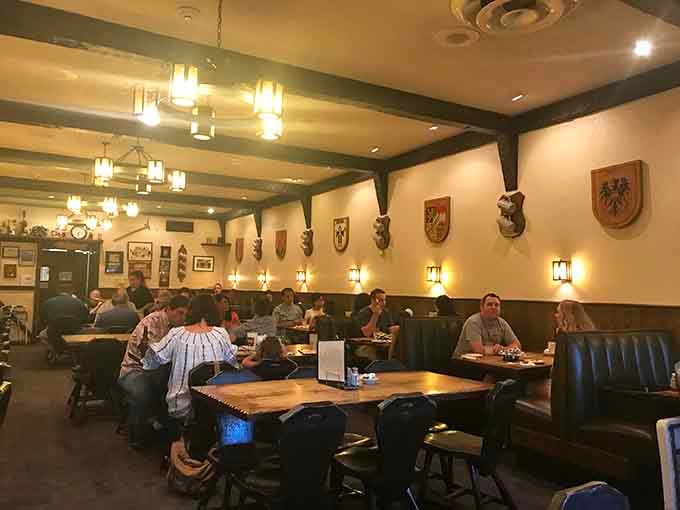 Exposed beams, cozy booths, and happy diners discovering that German comfort food is exactly what their souls needed today.