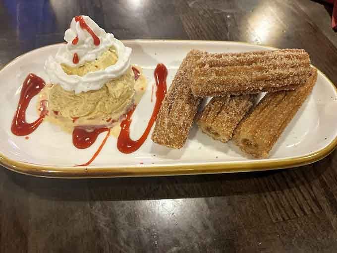 Churros and what appears to be tres leches cake provide the sweet ending your enchilada feast absolutely deserves.