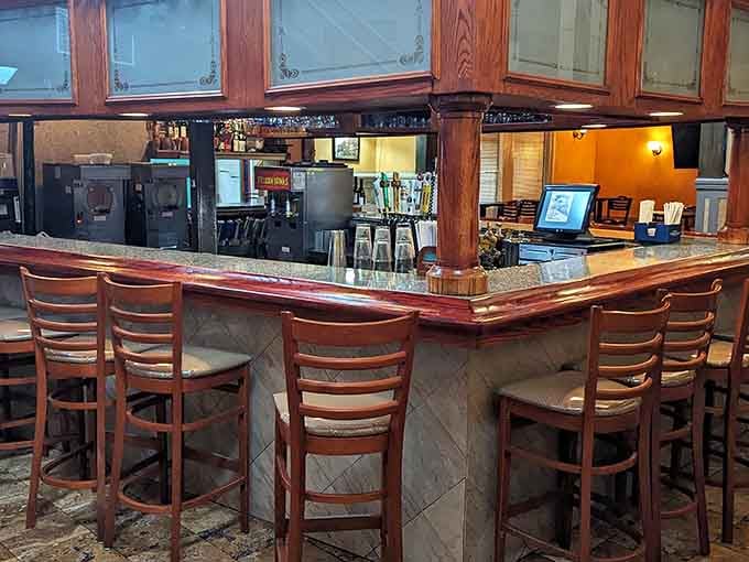 A polished bar area where you can belly up for margaritas while admiring the depot's original architectural bones and character.
