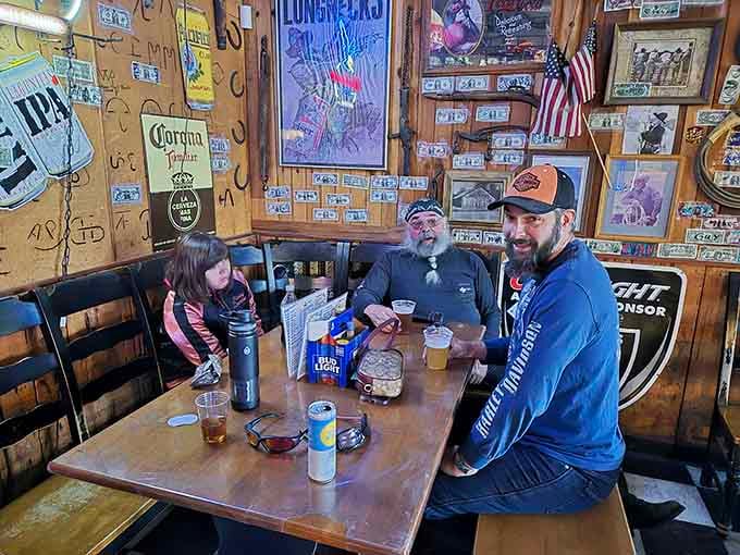 Happy diners enjoying cold drinks and good company, which is basically the recipe for a perfect afternoon.