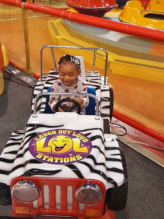 Tiny drivers take the wheel in zebra-striped vehicles, living their best Fast and Furious toddler fantasies.