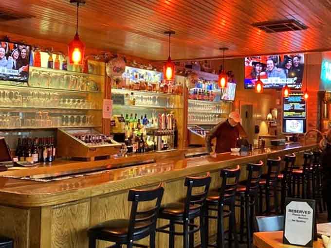 The welcoming bar area offers a comfortable spot to wait or enjoy a drink before your meal.