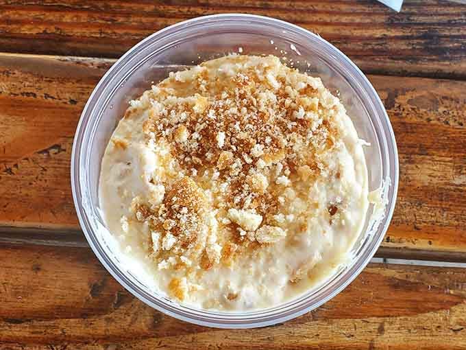 Banana pudding topped with cookie crumbles offers sweet redemption after your meat-induced flavor coma begins.