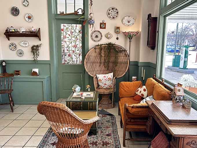 Wicker chairs and decorative plates create an atmosphere that feels like visiting your coolest aunt's house.