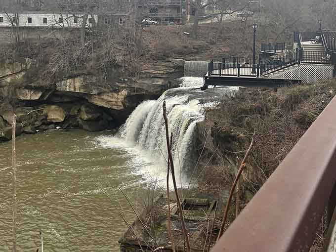 Black River's waterfall cascades through the city, offering natural beauty accessible to everyone, not just country club members.